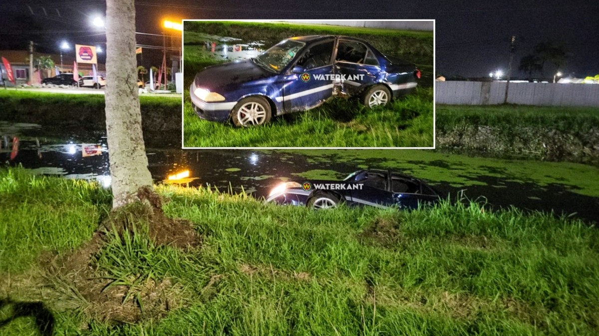 Automobilist crasht tegen boom en belandt in kreek langs Ringweg ...